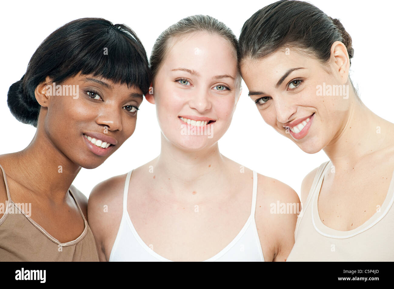 Three young women smiling Stock Photo - Alamy