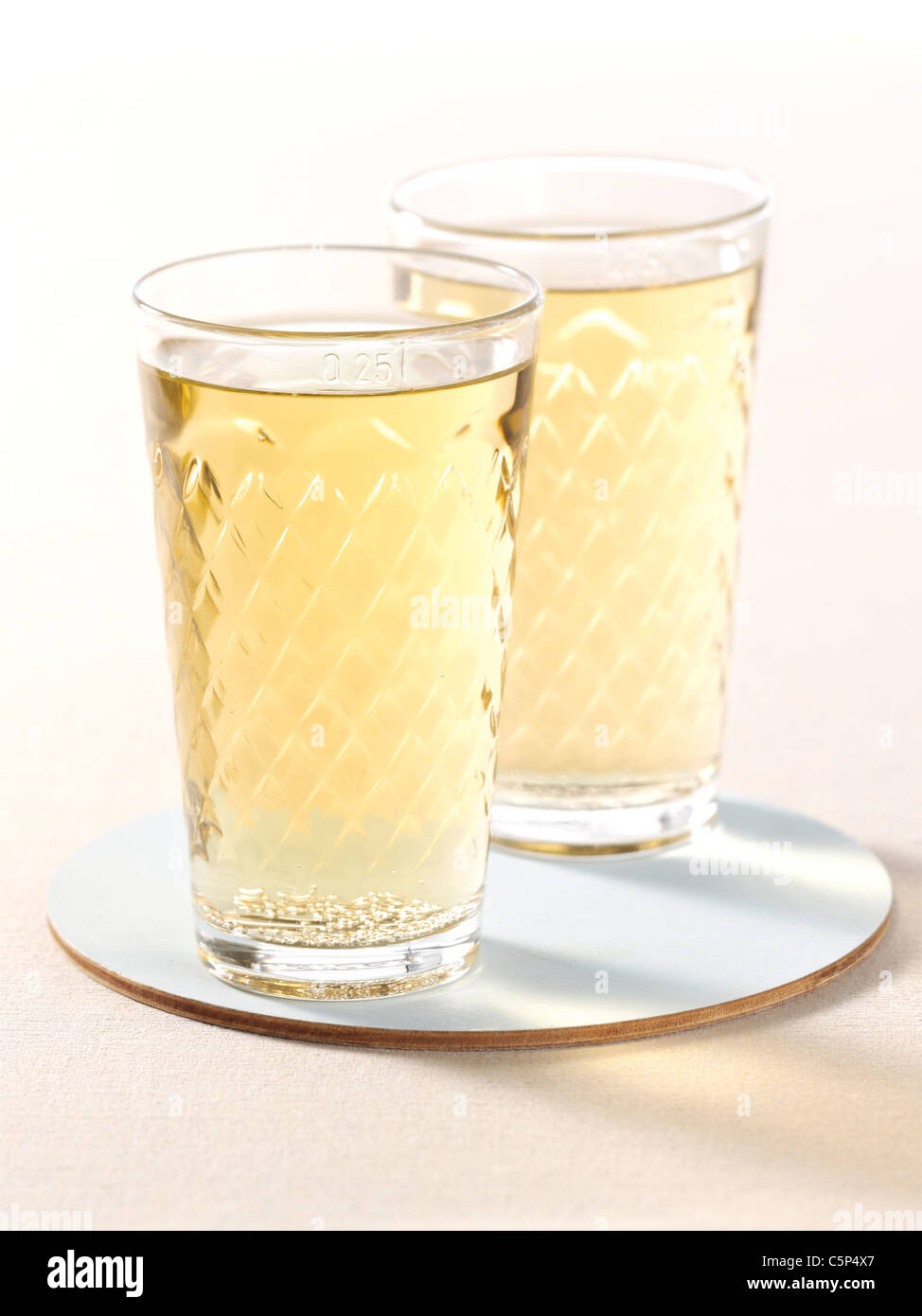 Two glasses with cider Stock Photo - Alamy