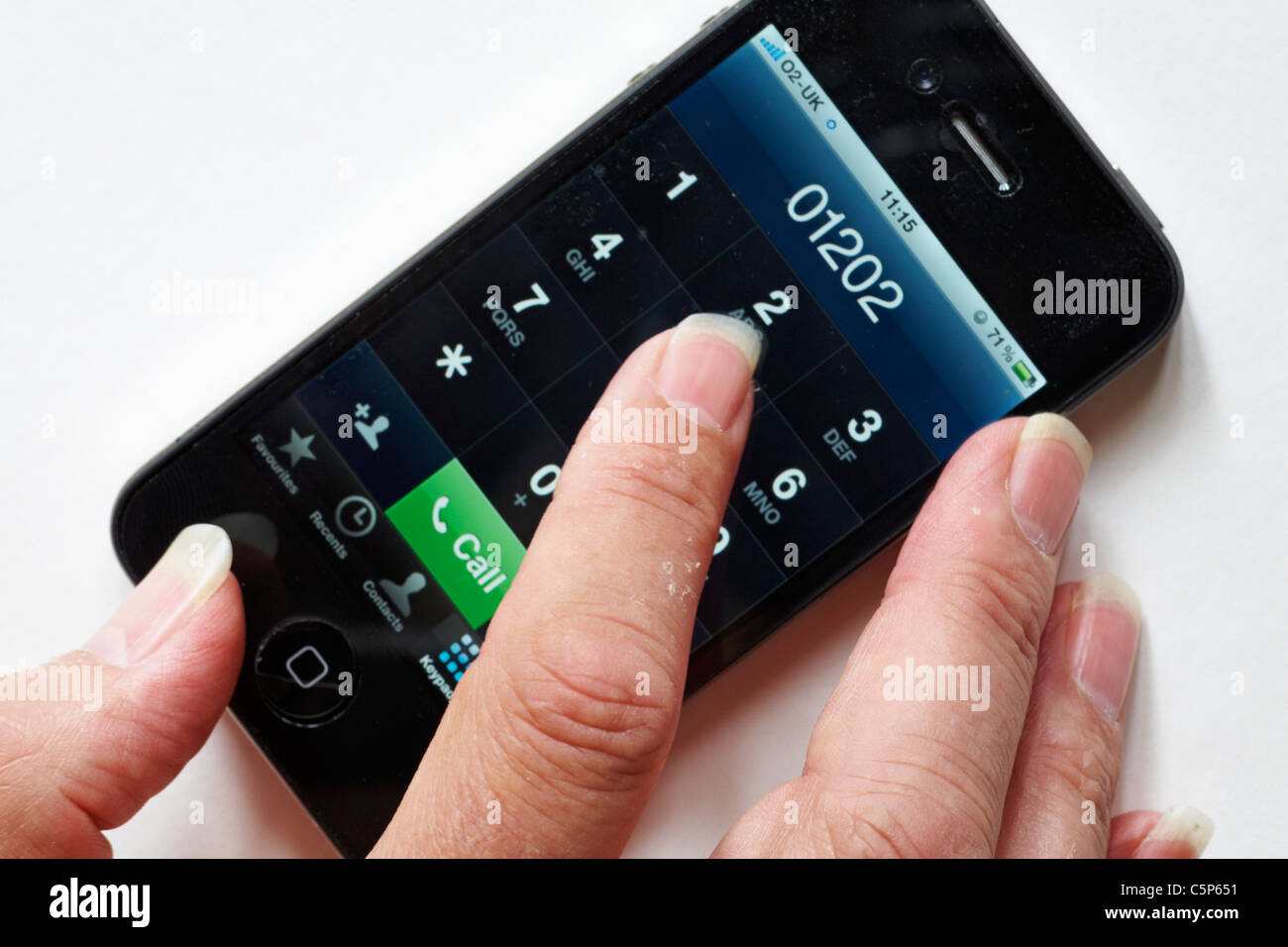 Keying in telephone number hi-res stock photography and images - Alamy