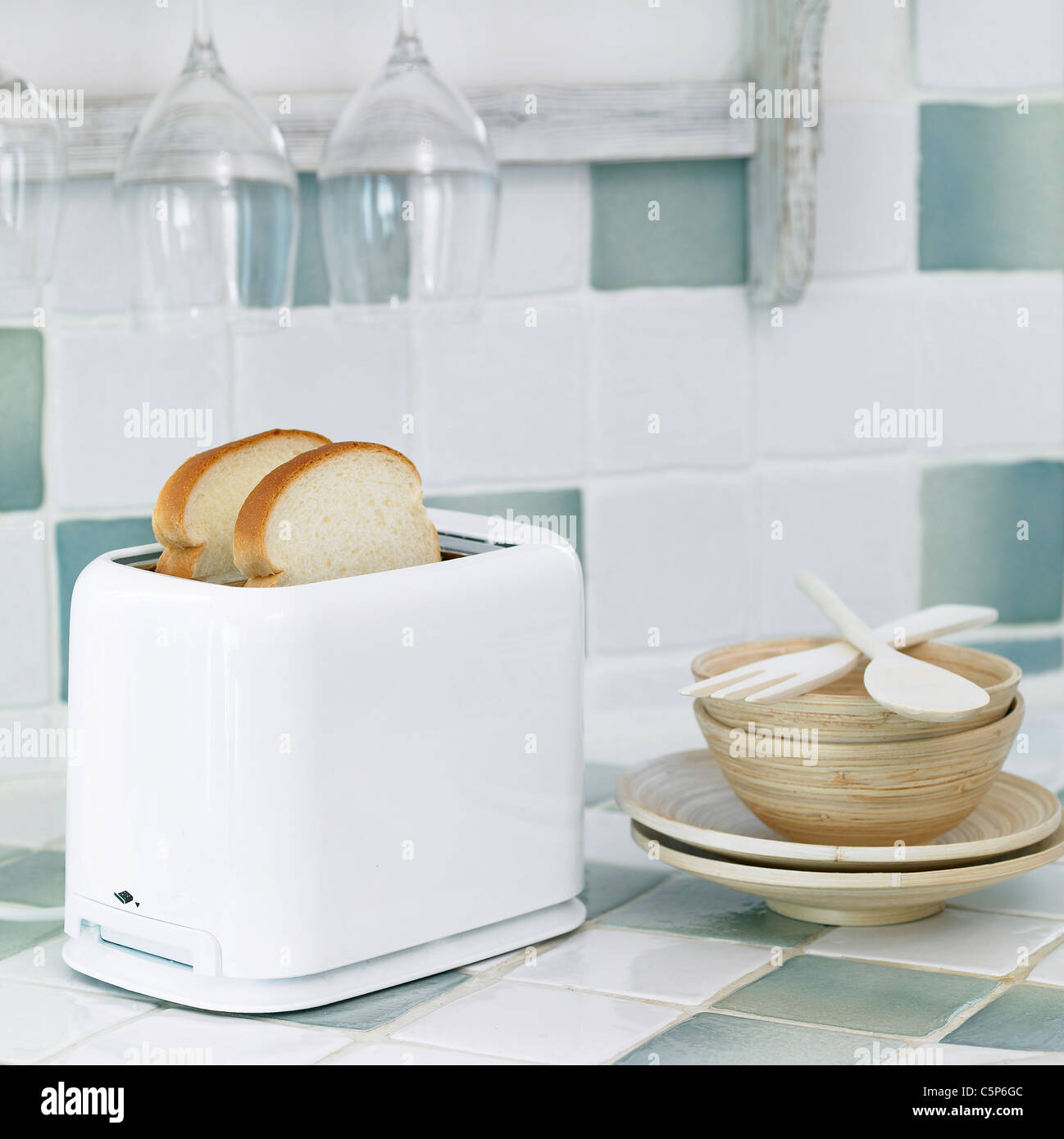 Toaster and dishes Stock Photo - Alamy
