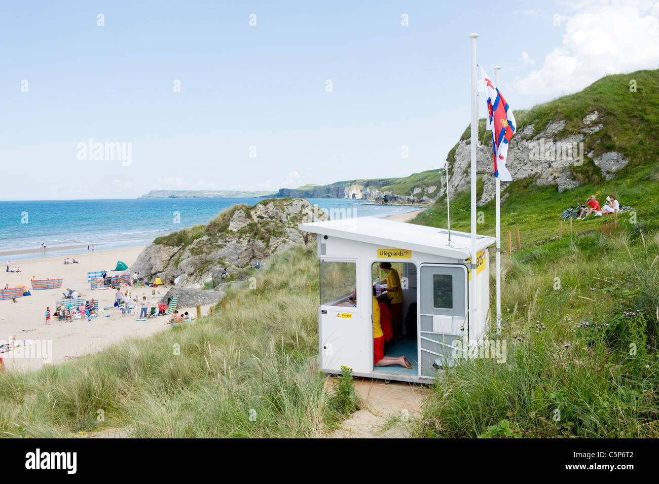 The White Rocks beach in Portrush, Northern Ireland. Lifeguard station ...