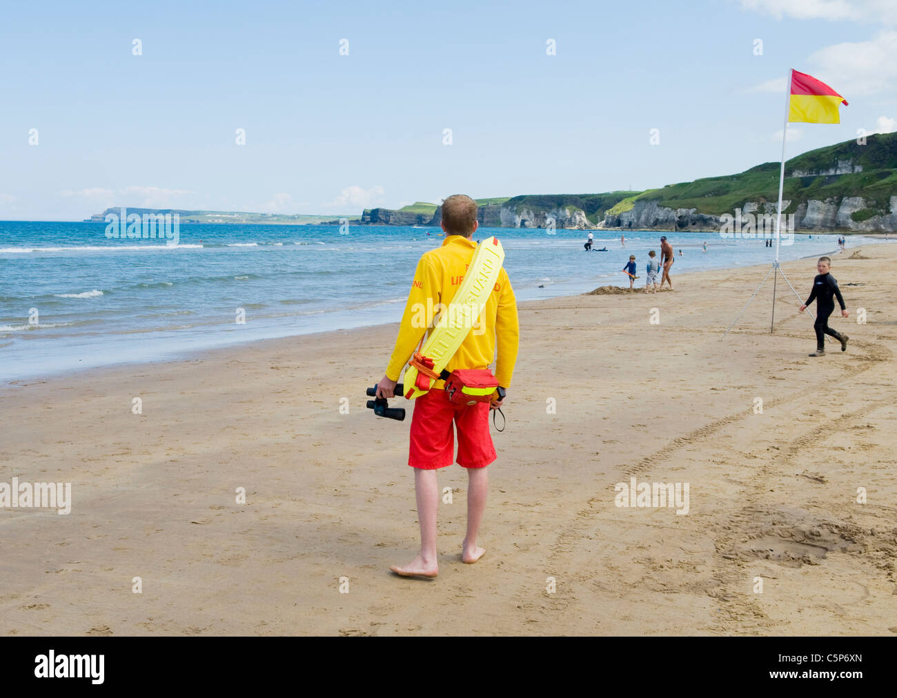 The White Rocks beach in Portrush, Northern Ireland. Lifeguard with ...