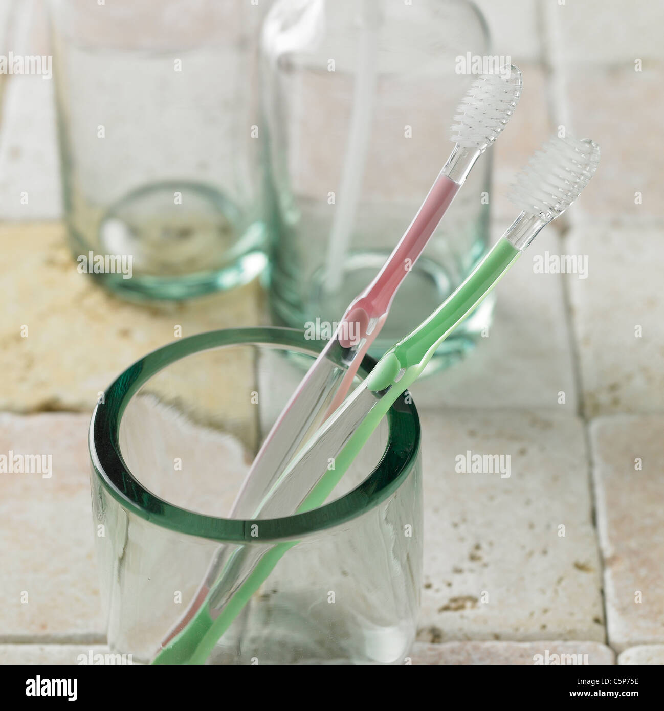 Toothbrush and glass cup Stock Photo - Alamy