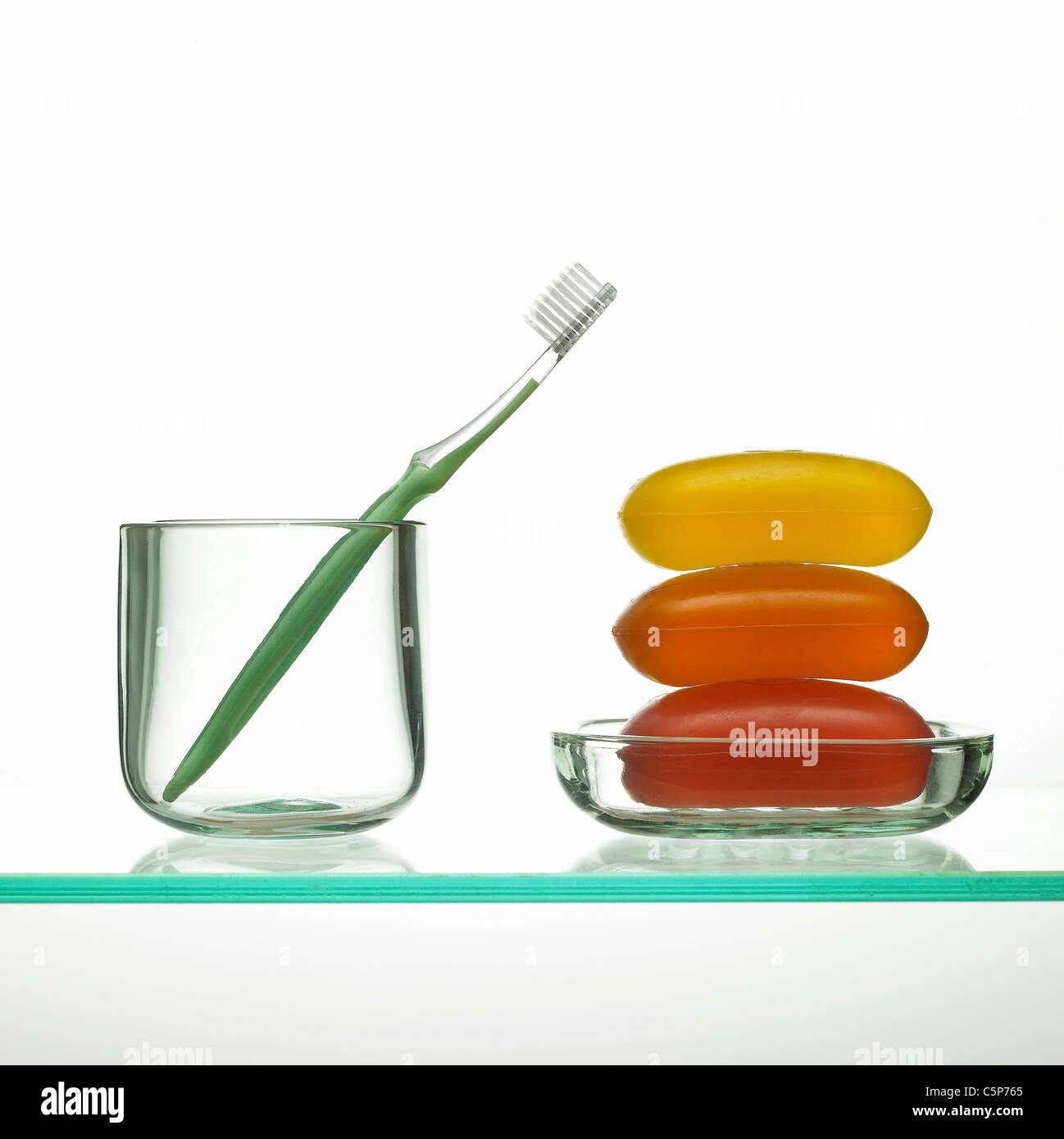 Toothbrush and soaps Stock Photo - Alamy