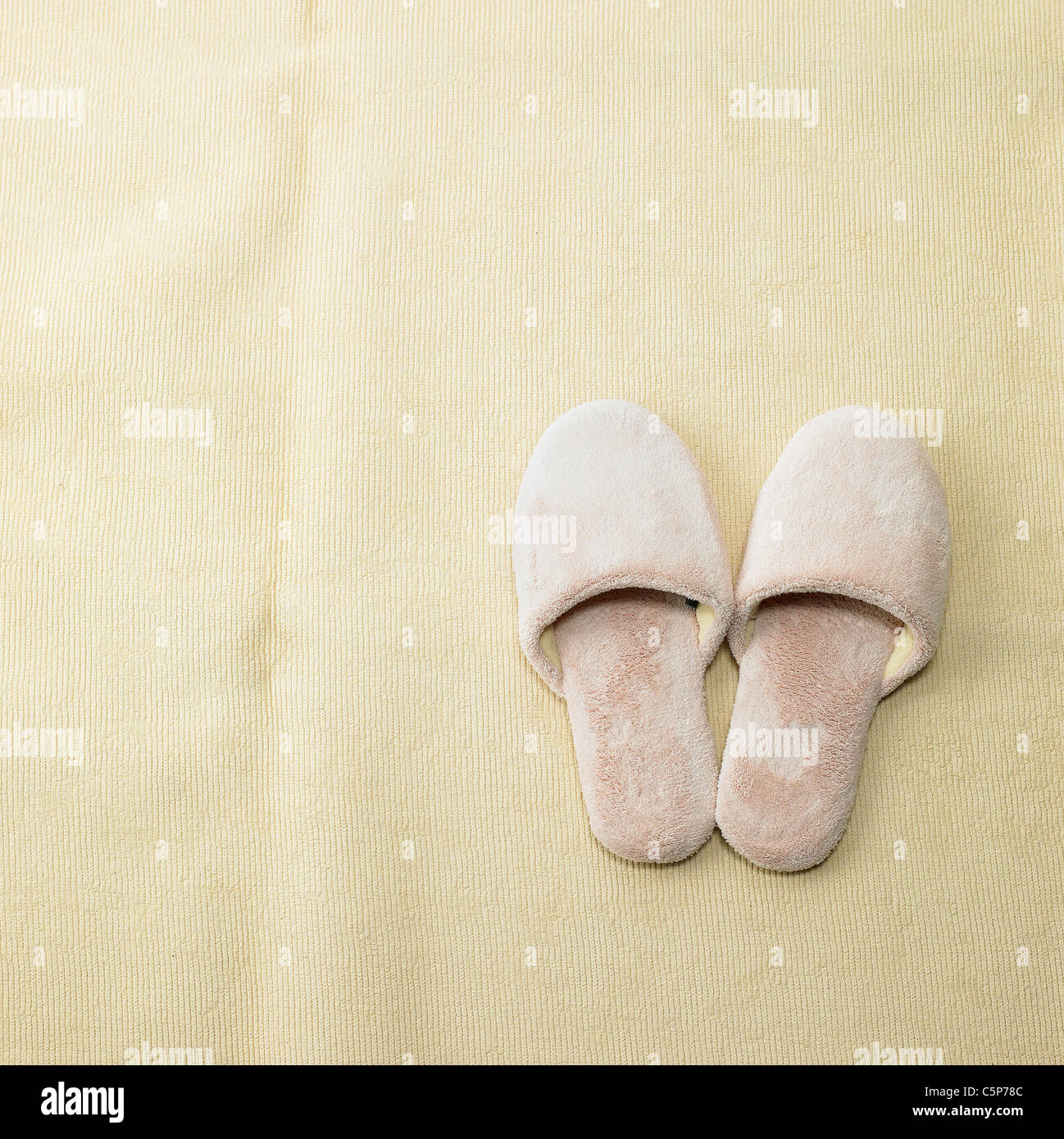 Slippers on the ground Stock Photo - Alamy
