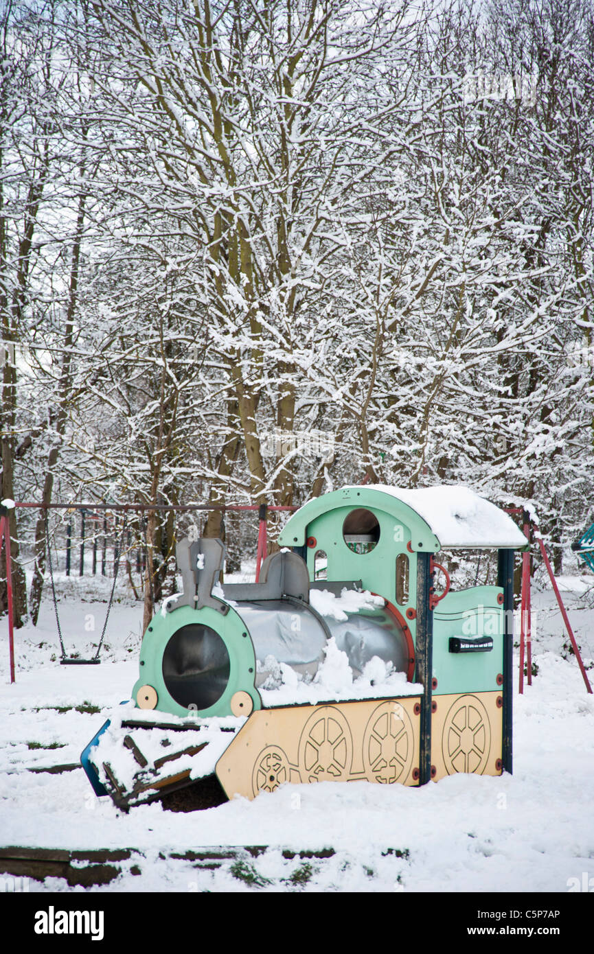 Children's playground in snow Stock Photo - Alamy