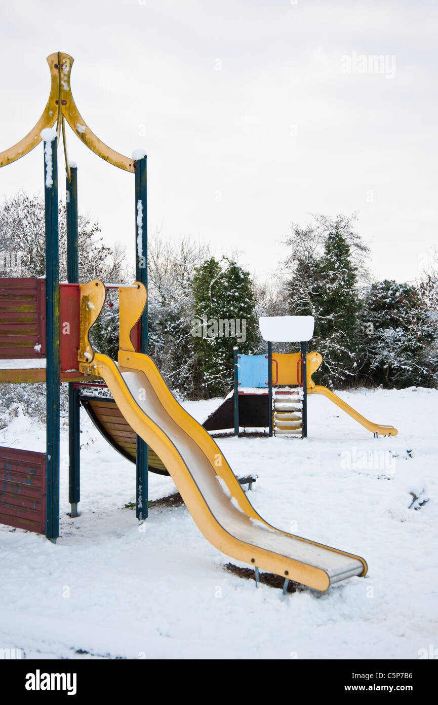 Children's playground in snow Stock Photo - Alamy