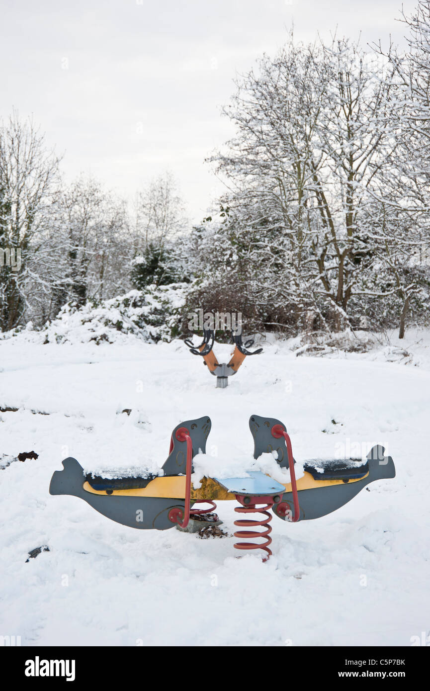 Children's playground in snow Stock Photo - Alamy