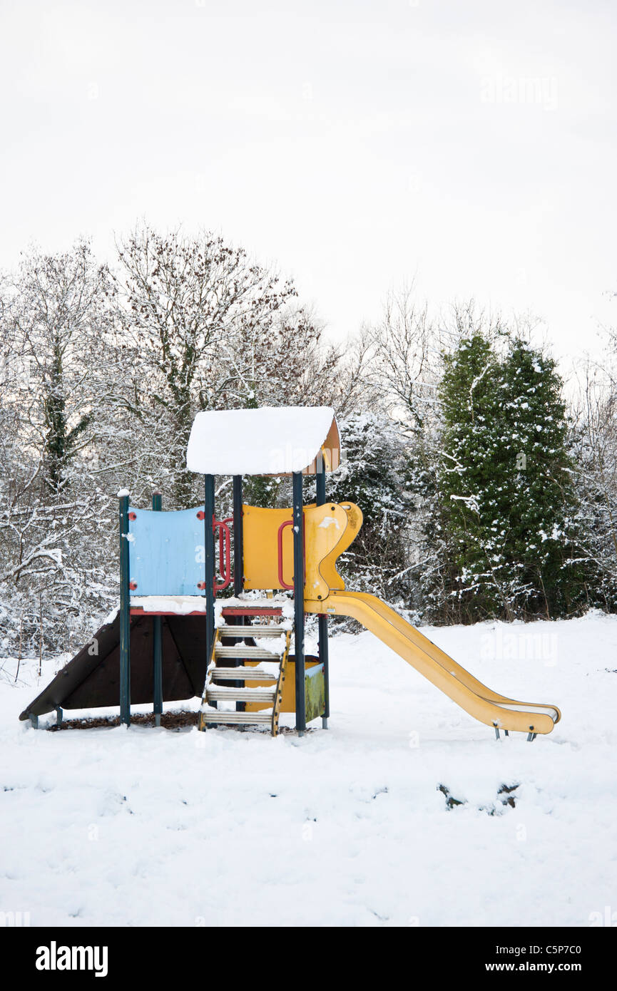 Children's playground in snow Stock Photo - Alamy