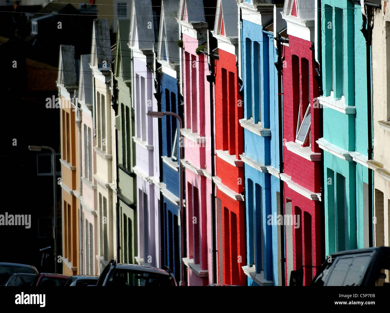 Terraced houses painted in different colours along Blaker Street ...