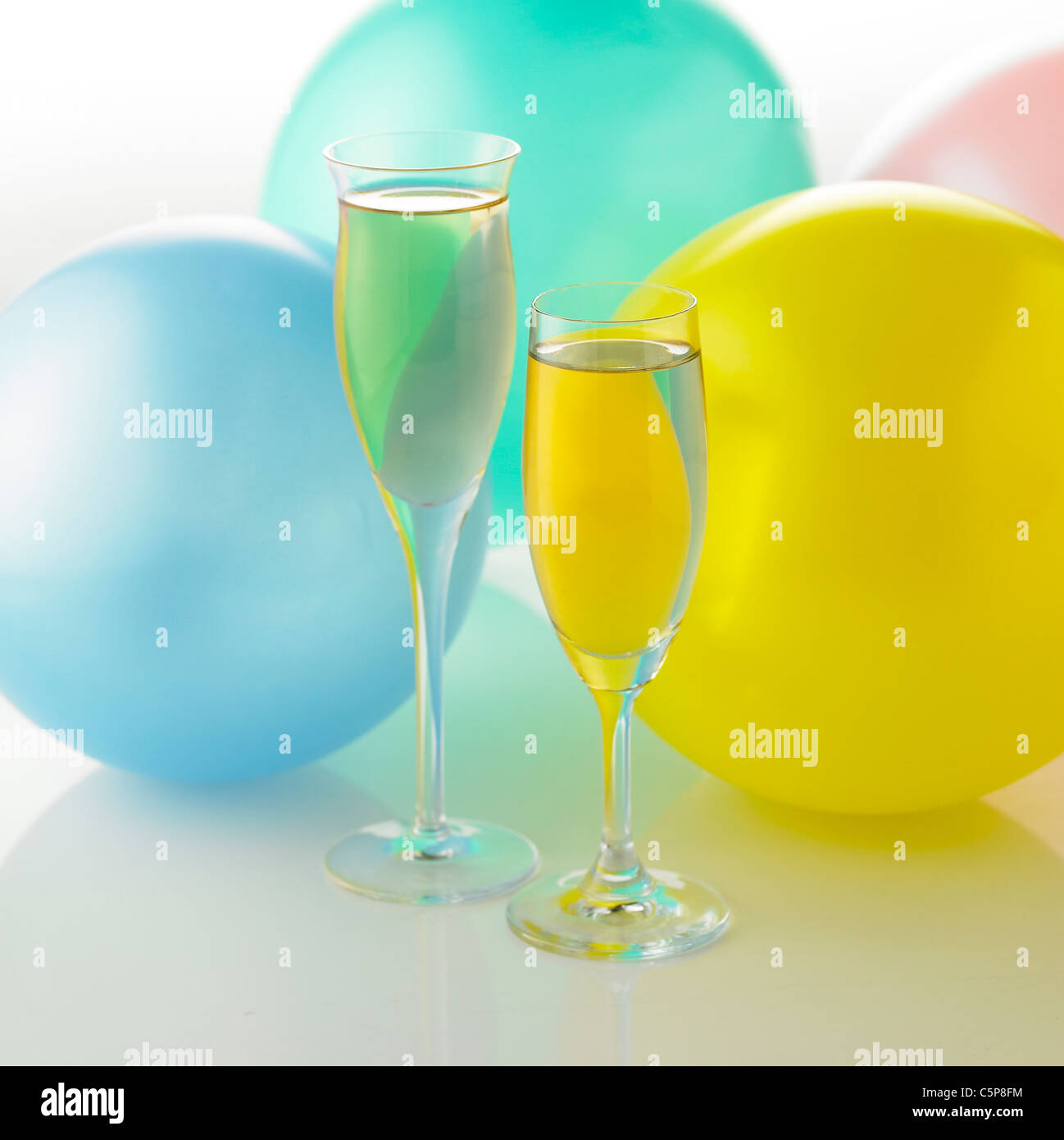 Champagne glass and balloons Stock Photo - Alamy