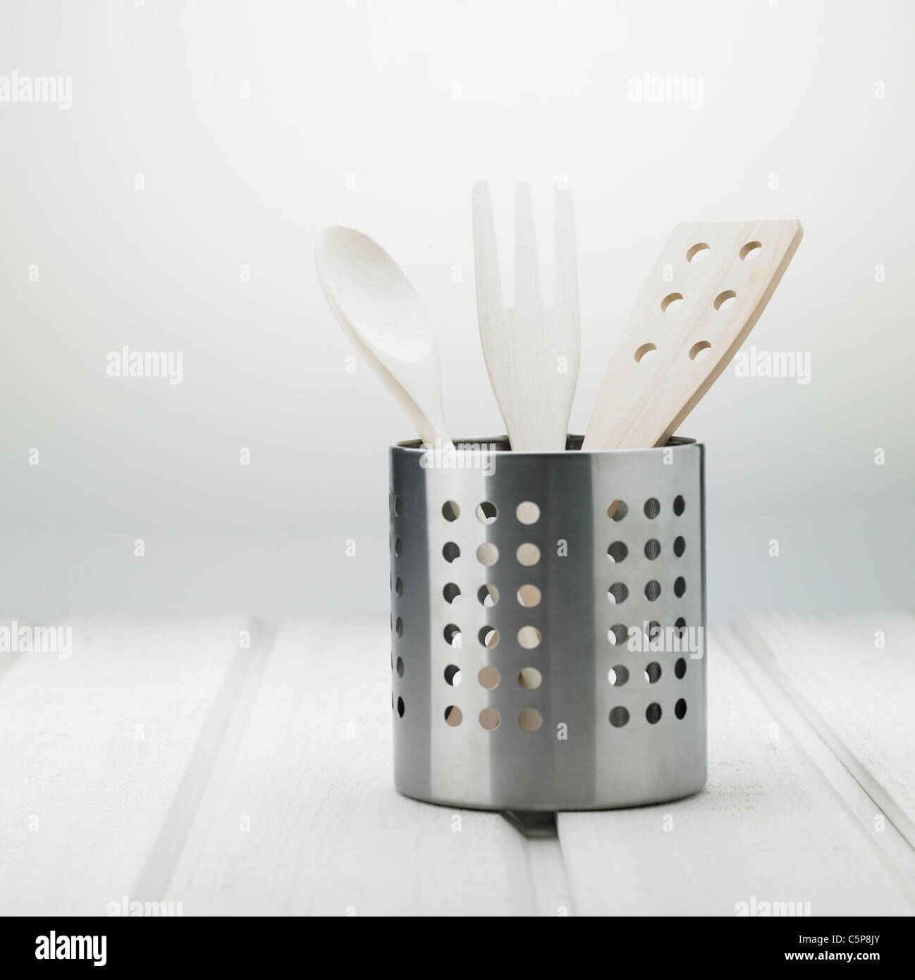 A spoon, a turner and a fork Stock Photo - Alamy