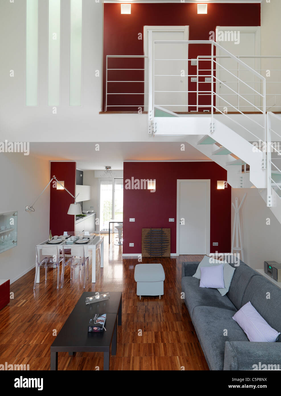 modern living room with dining table and kitchen view Stock Photo - Alamy