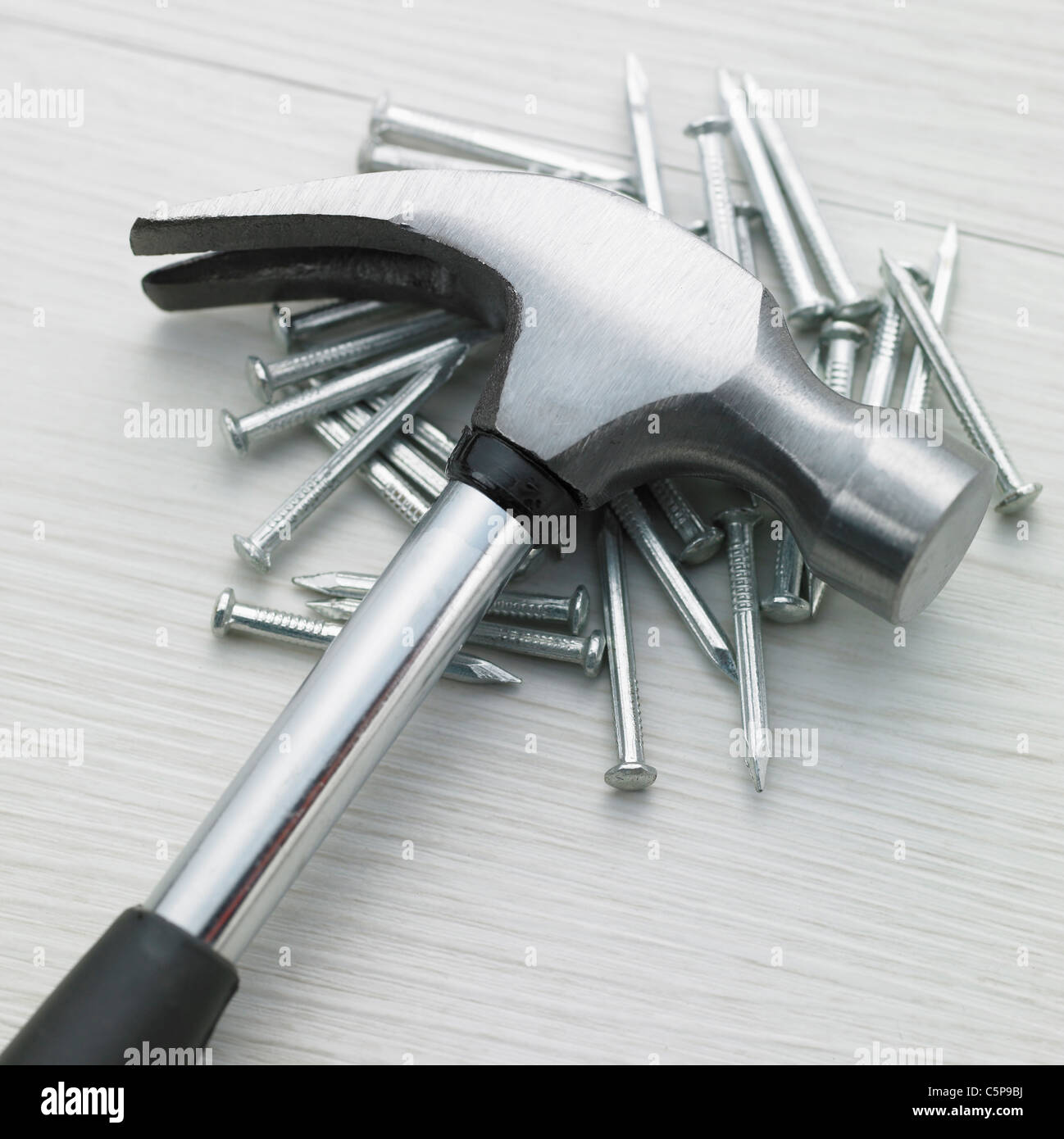 A hammer and nails Stock Photo - Alamy