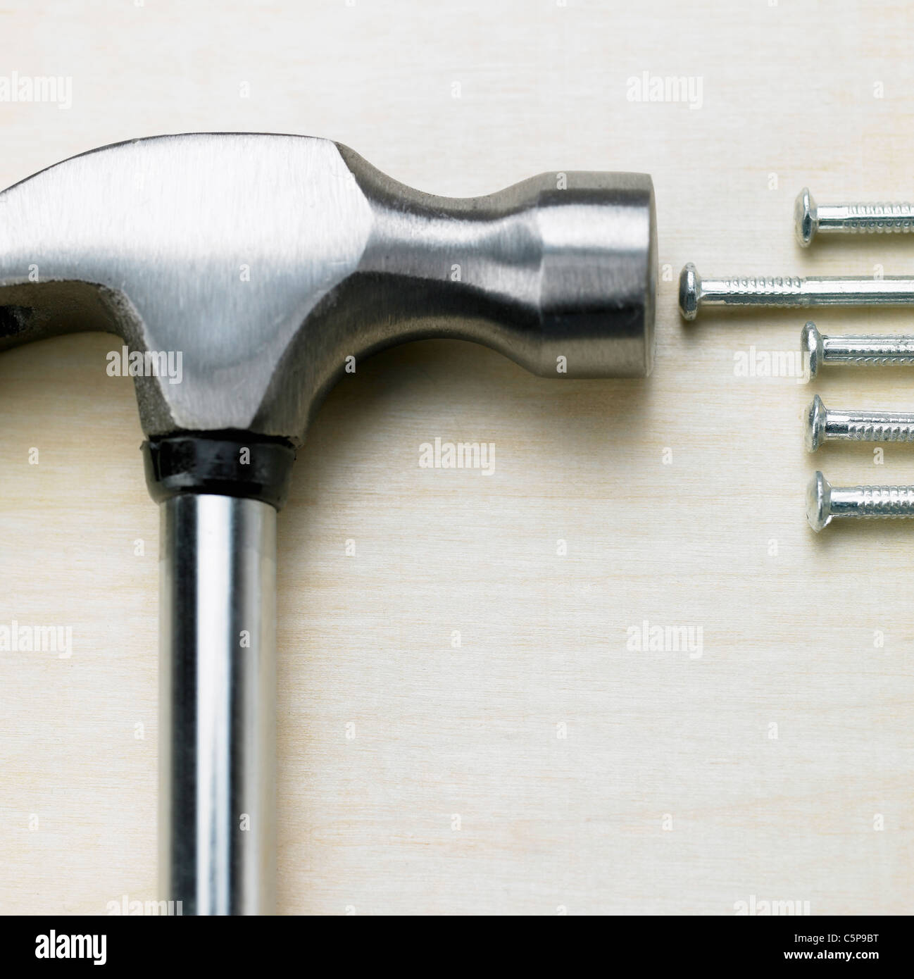 A hammer and nails Stock Photo - Alamy