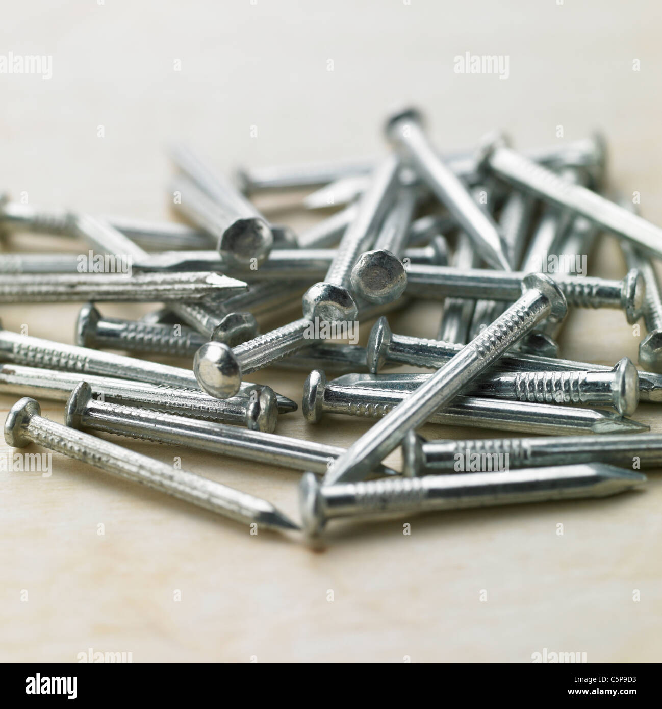 Pile of nails Stock Photo - Alamy