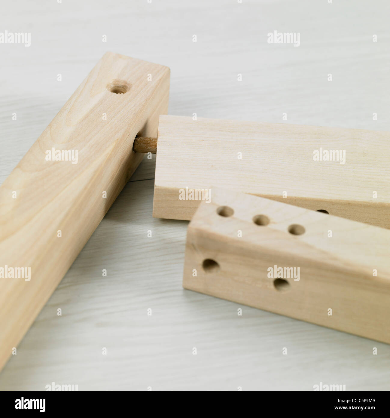 Assembling wood pieces Stock Photo - Alamy