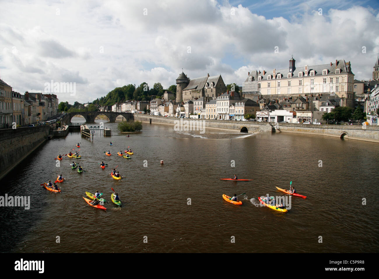 Young people on canoes down the river Mayenne. City of Laval (Mayenne ...