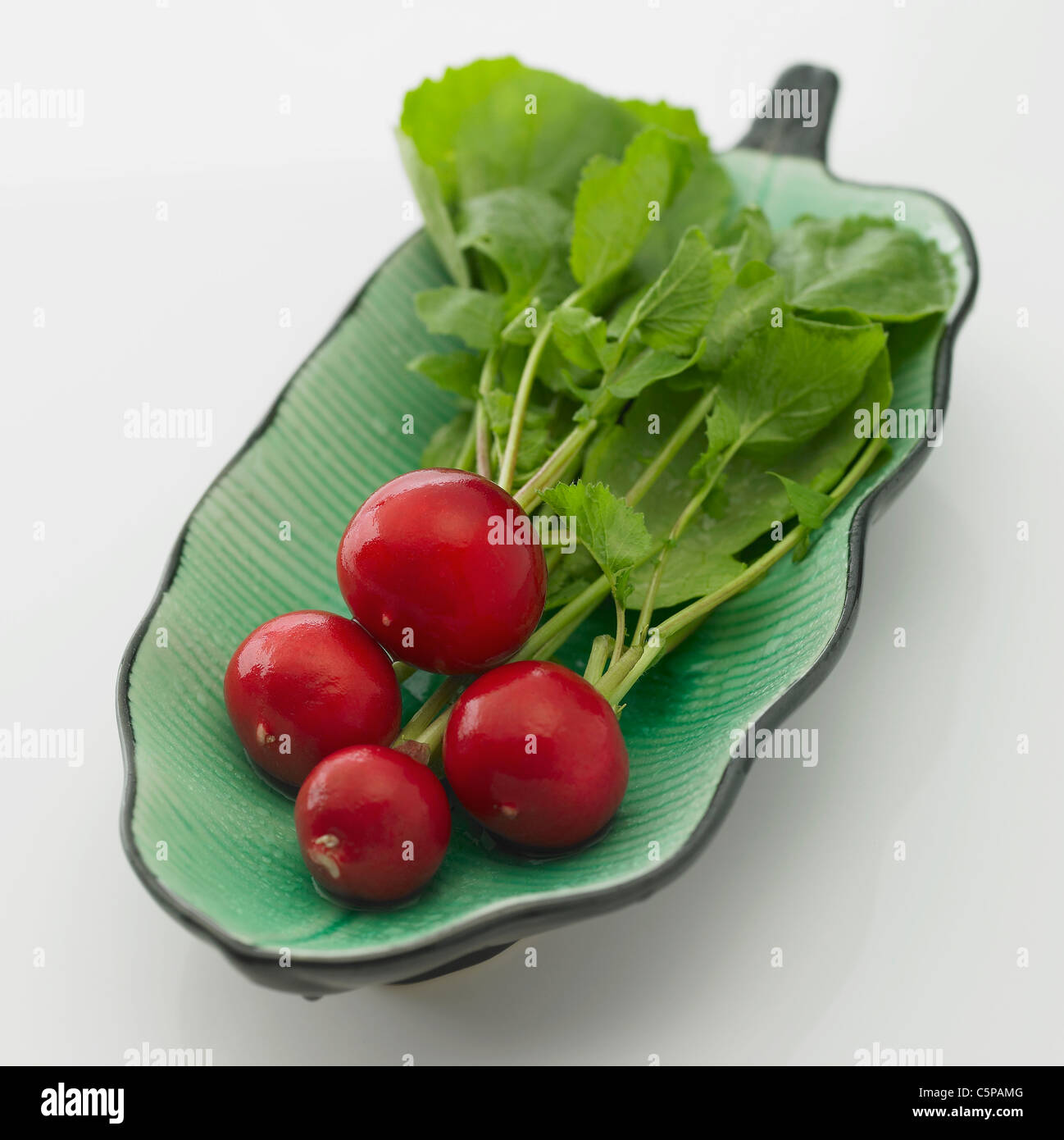 Cut radish leaves hi-res stock photography and images - Alamy