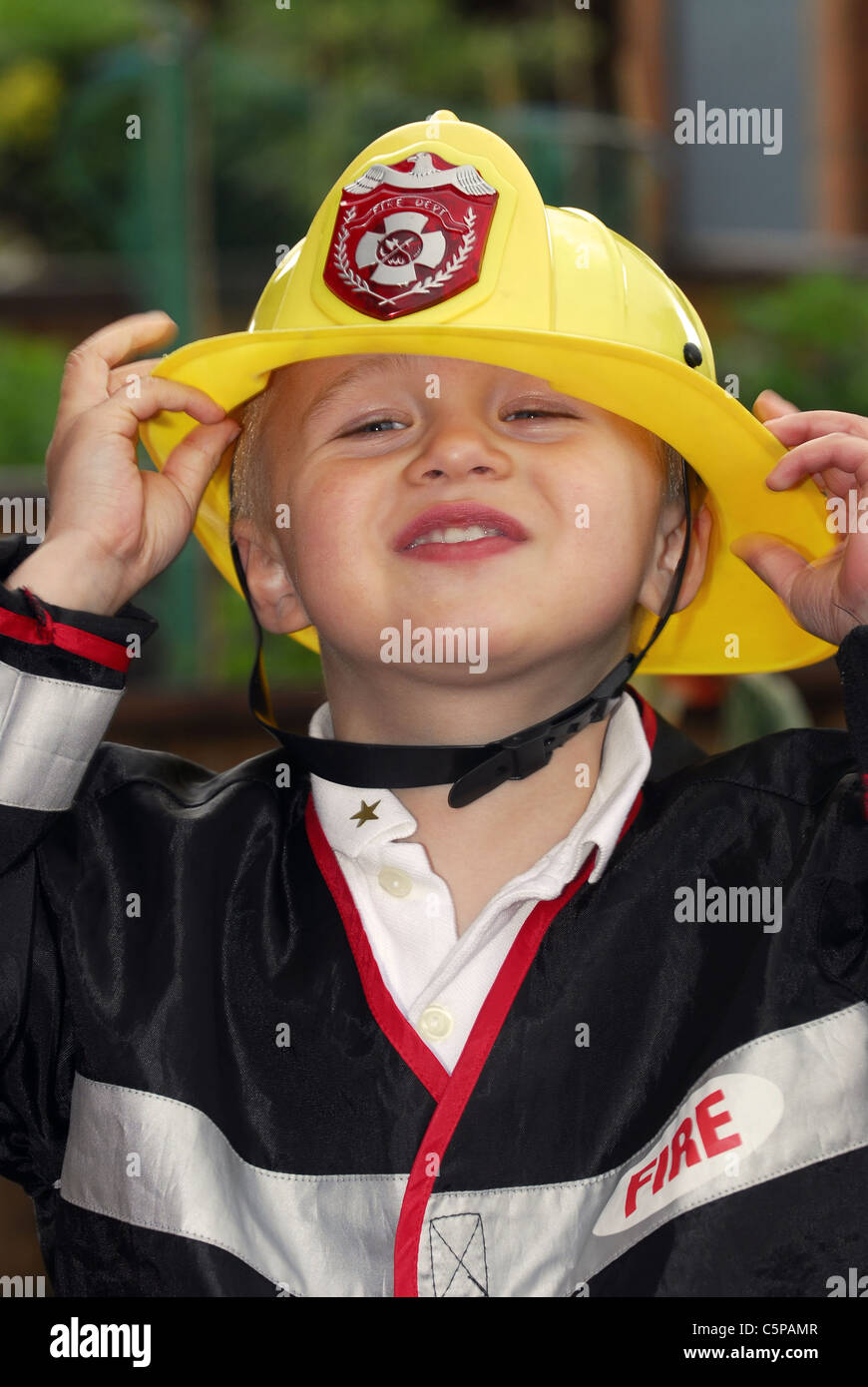 Child fireman uk hi-res stock photography and images - Alamy