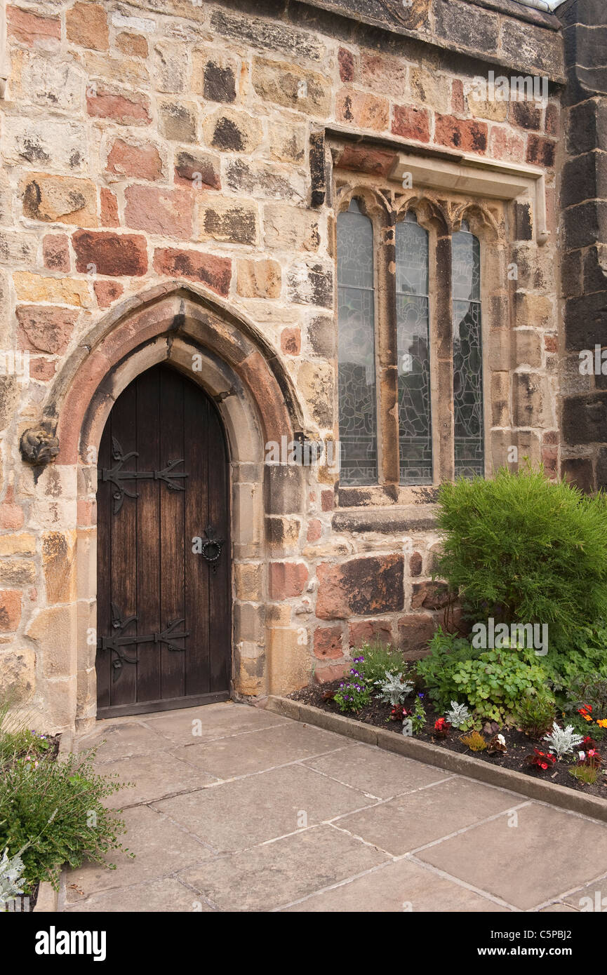 Holy Trinity Church, Skipton - doorway exterior close-up, wooden door ...