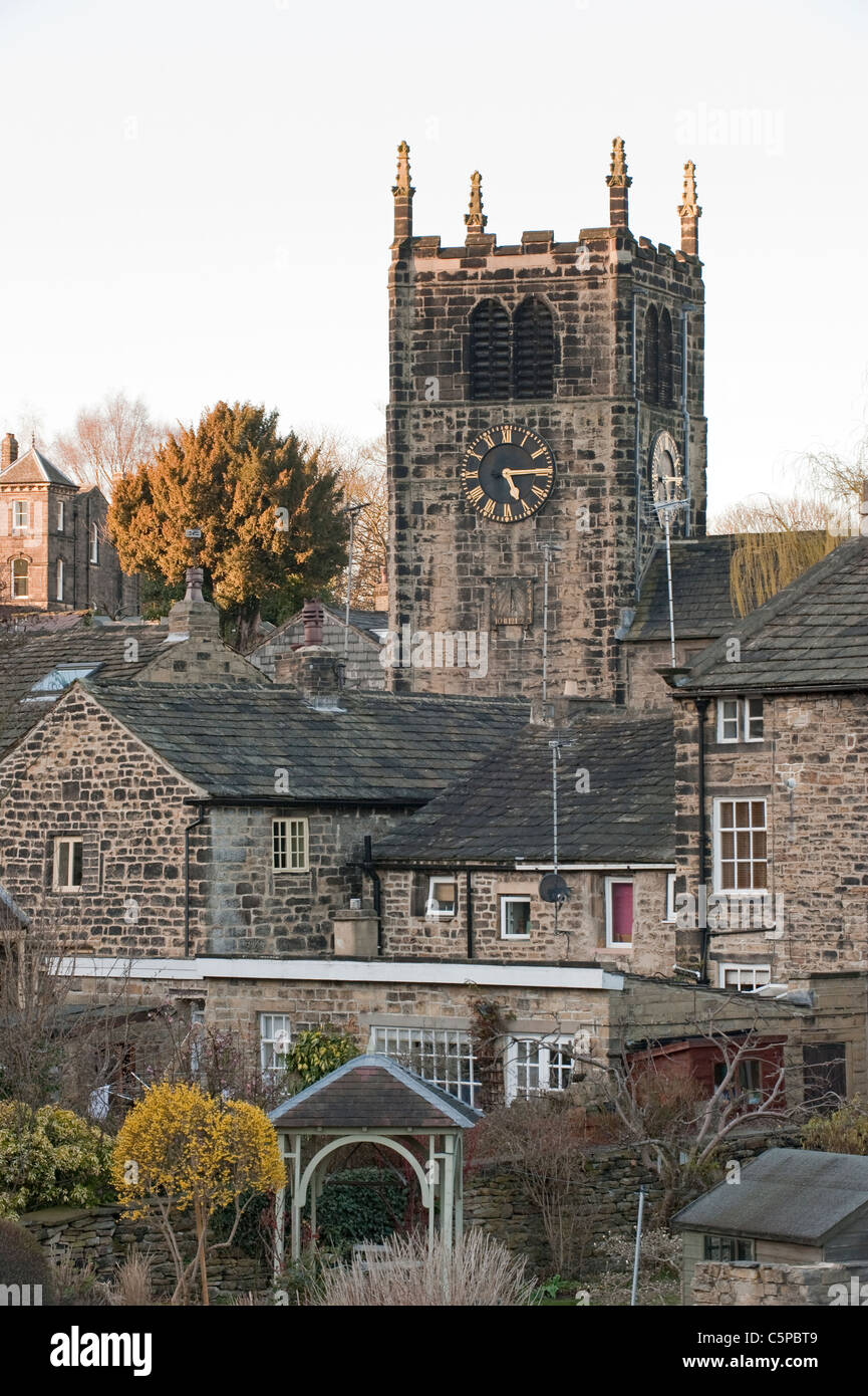 Scenic townscape (stone-built cottages & houses nestling in shadow of ...