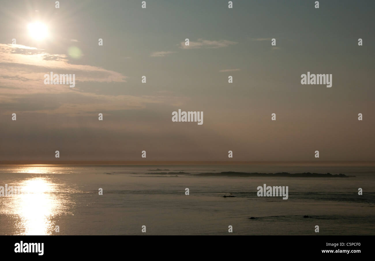 Sunset over island of Burhou seen from Alderney, Channel Islands Stock ...