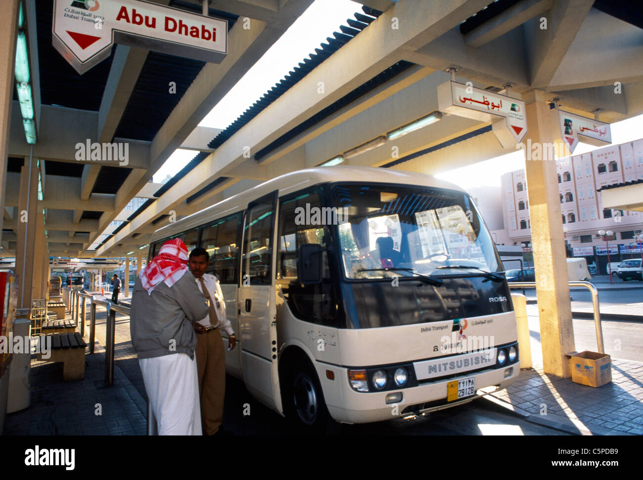 Abu Dhabi UAE Drivers And Bus at Bus Station Stock Photo - Alamy