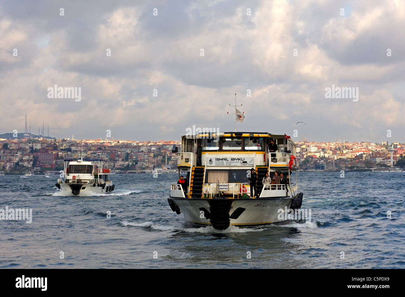 Ferry boats crossing the Bosphorus from the Asian to the European part ...