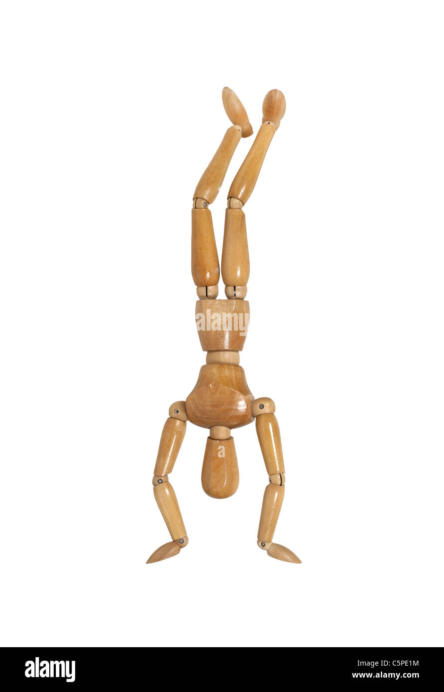 Wooden model representing a person doing a hand stand - path included ...