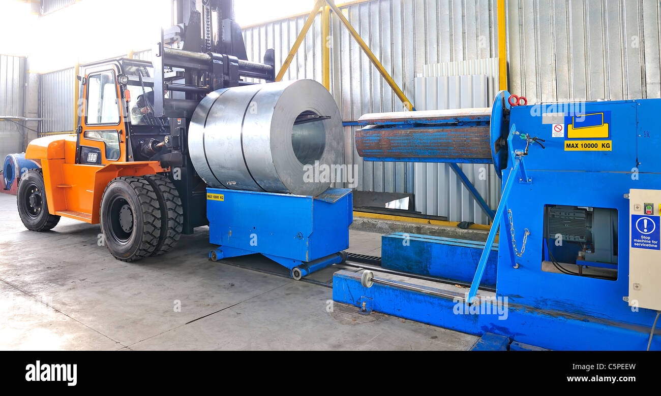 machine for rolling steel sheet in warehouse Stock Photo - Alamy