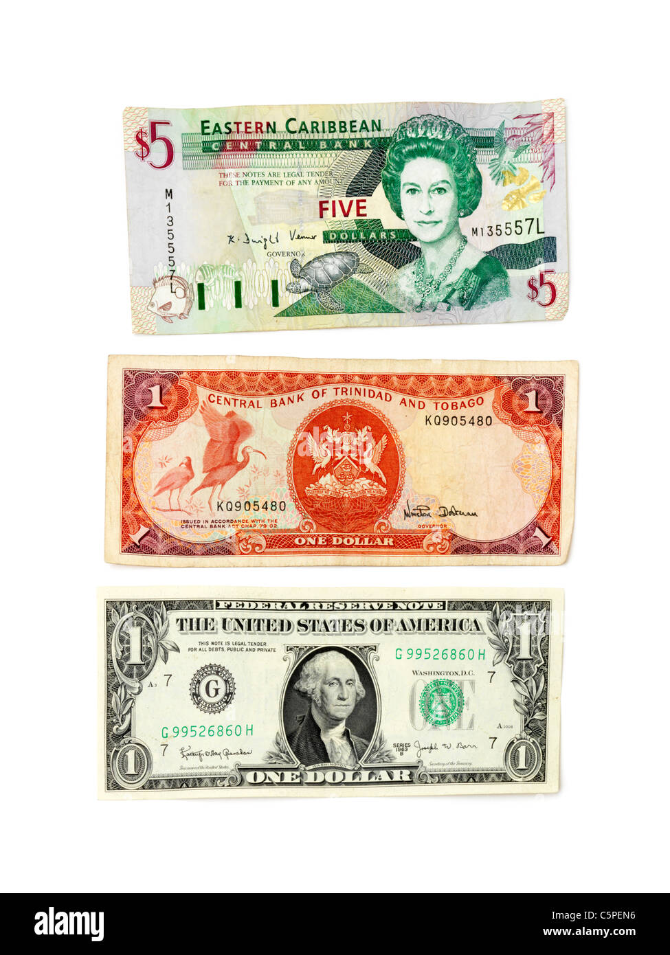 An Eastern Caribbean $5 note, a Central Bank of Trinidad and Tobago $1 ...