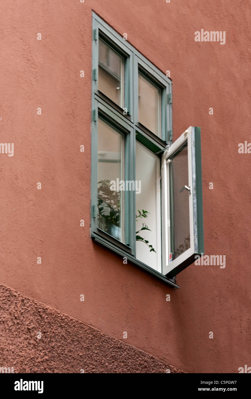 old open windows with colored flowers on the wall Stock Photo - Alamy
