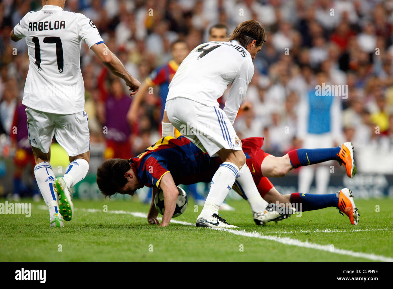 Messi falling down, UEFA Champions League Semifinals game between Real ...