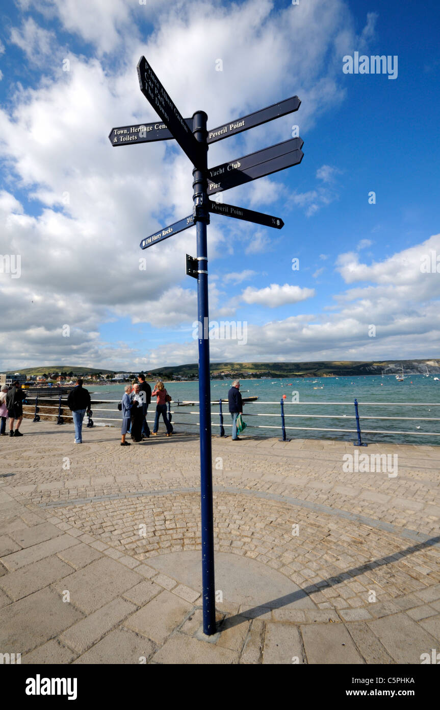 Signpost at Swanage Seafront, Dorset, England Stock Photo - Alamy