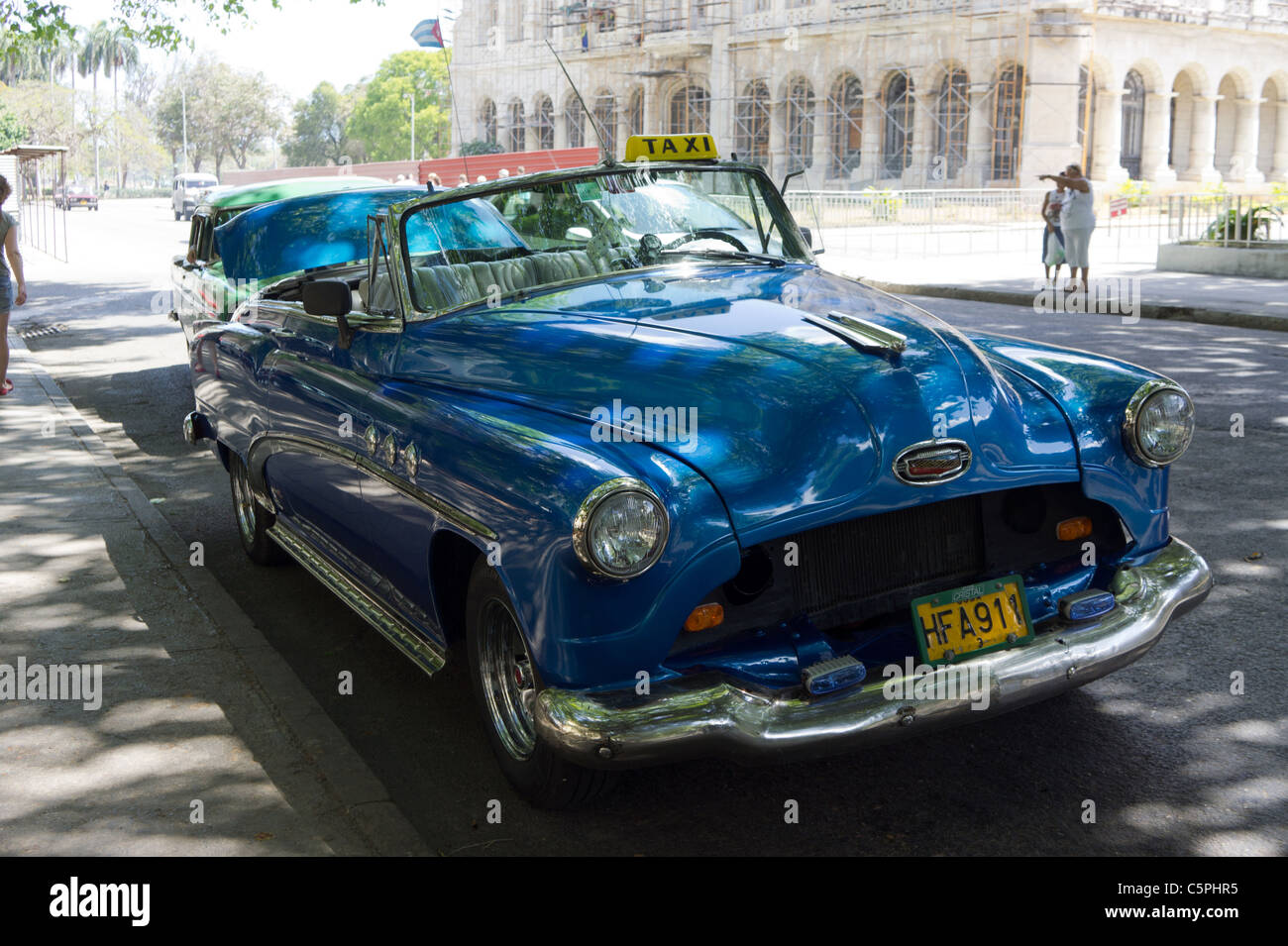 Old American car (Buick Super Convertible circa 1951-1953) on streets ...
