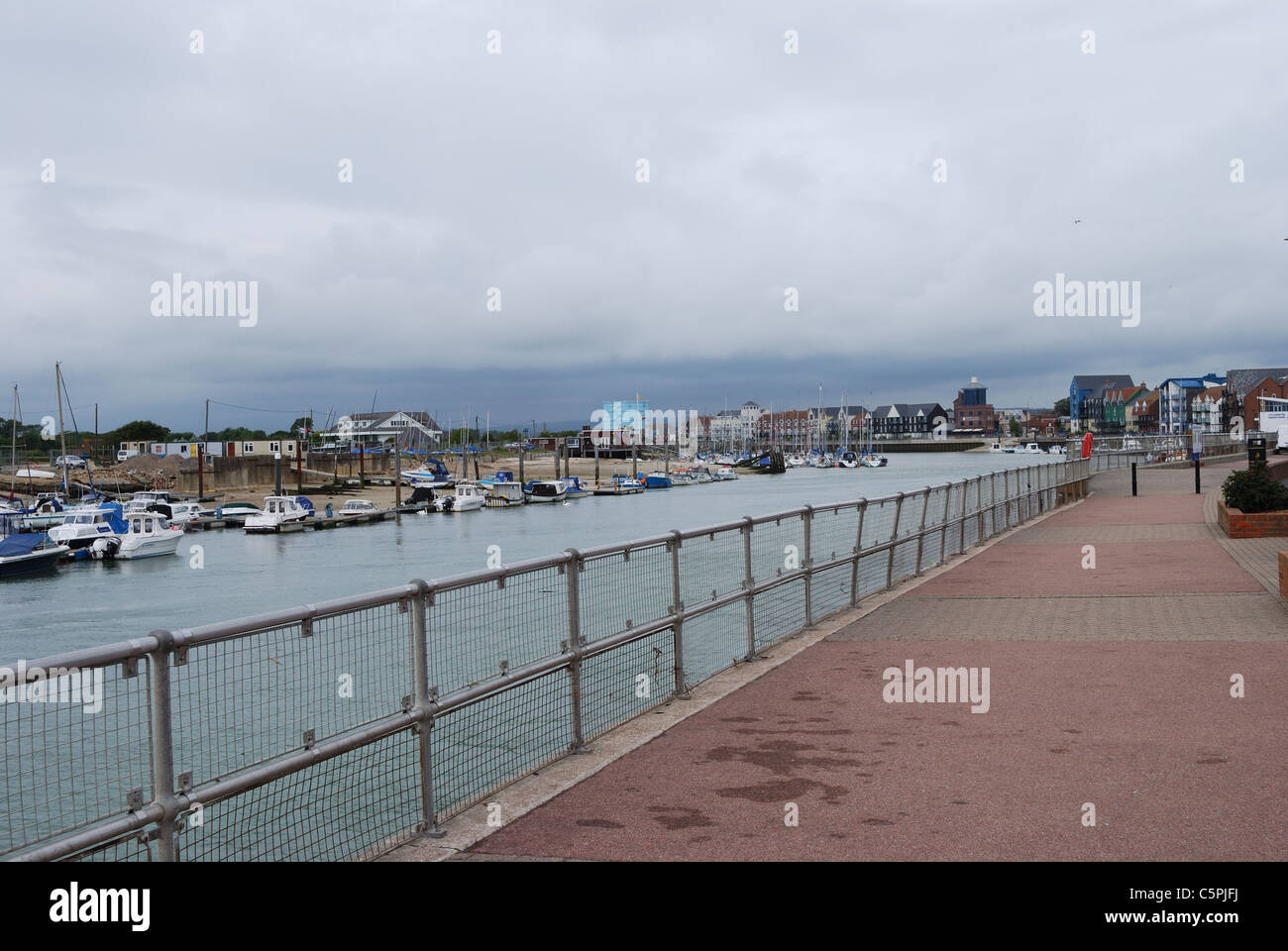 A walk by the River Arun in Littlehampton, with a threatening sky in ...