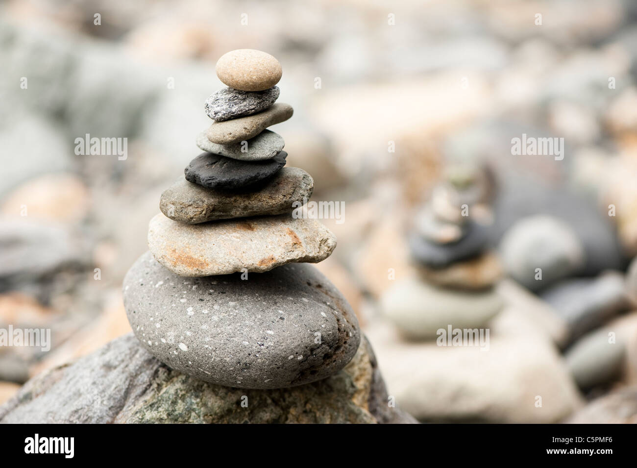 Stacks of balanced pebbles on Abereiddy Beach in North Pembrokeshire ...