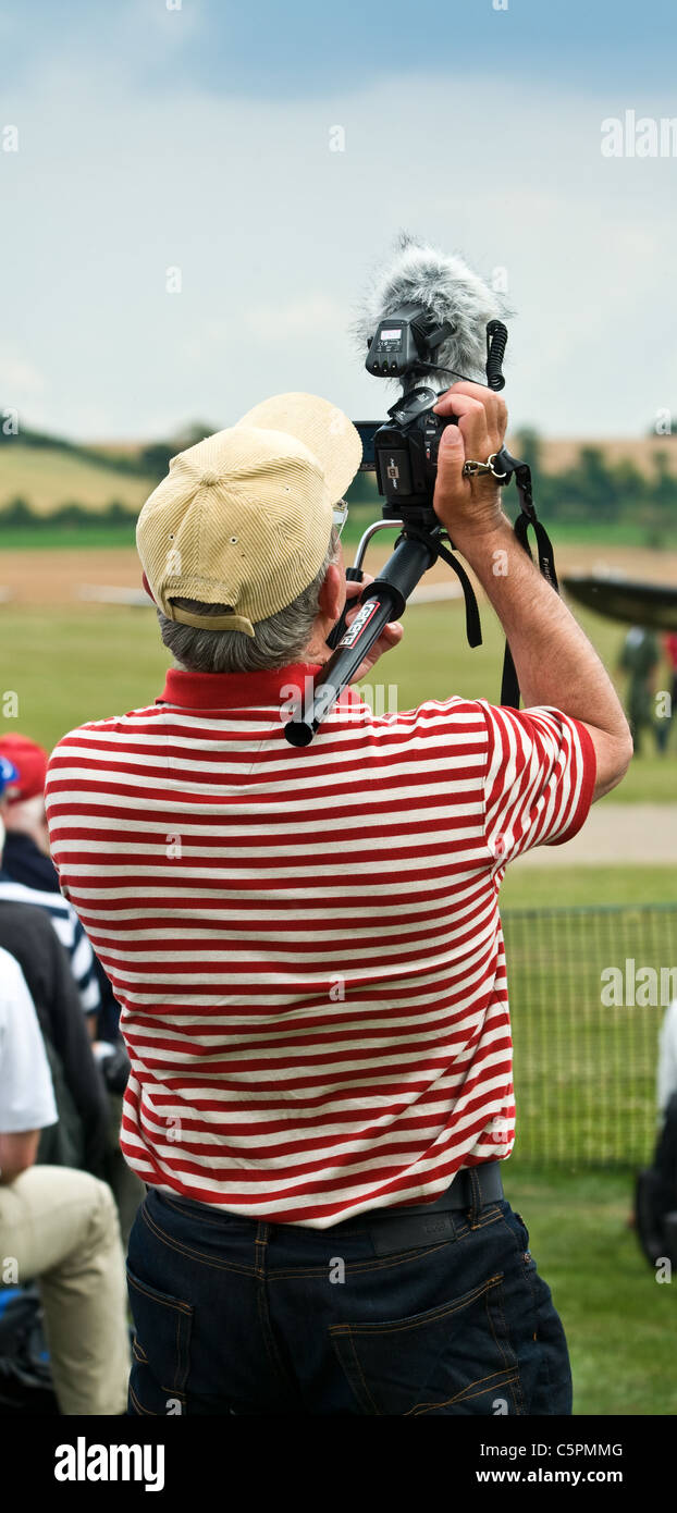 Pointing the video camera toward the action Stock Photo - Alamy