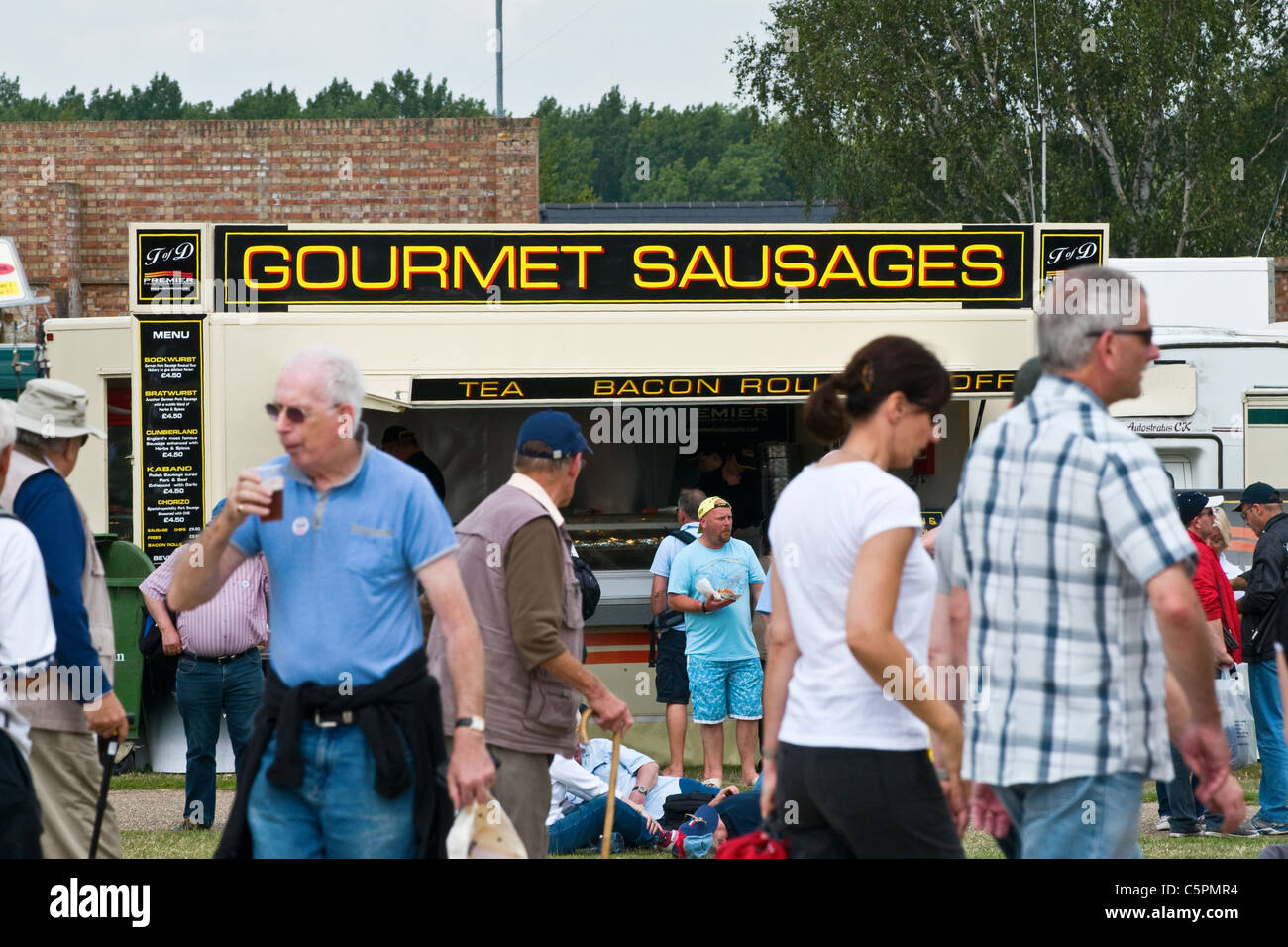 Gourmet Sausage trailer at a public event Stock Photo - Alamy