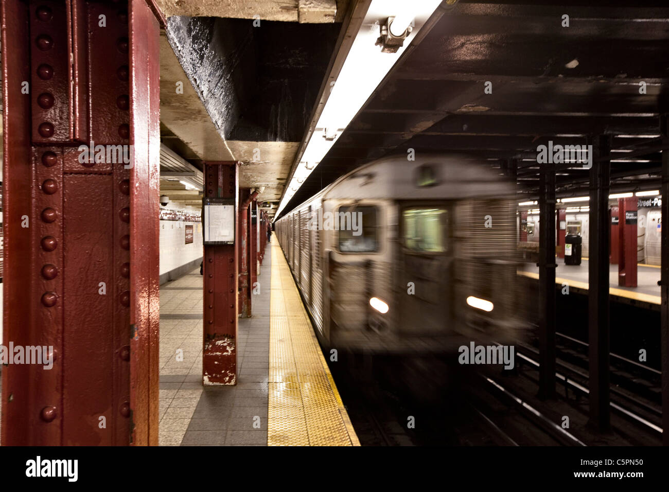 Oncoming subway train at New York City's Penn Station Stock Photo - Alamy