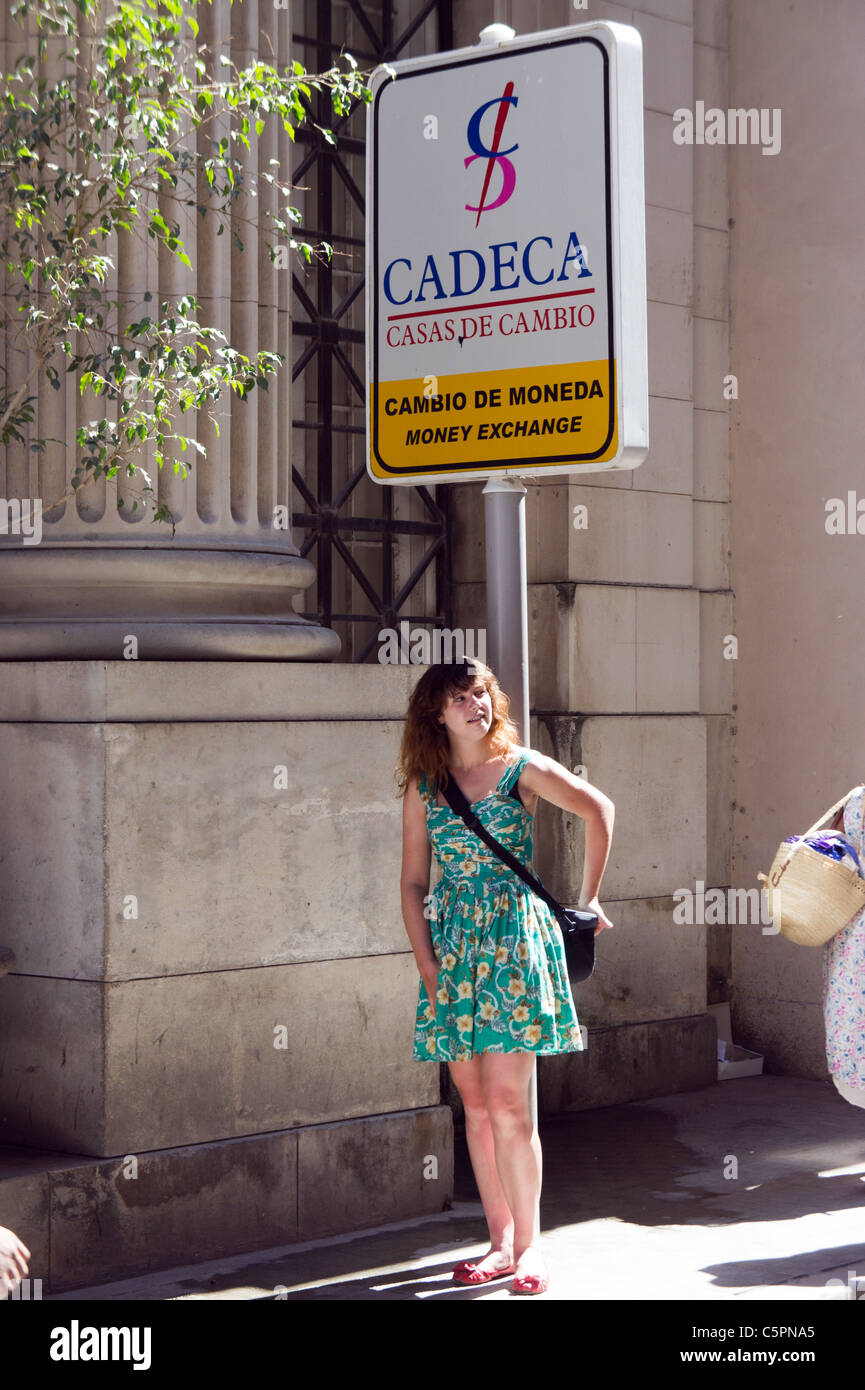 Young woman under a Cadeca sign in Havana, Cuba Stock Photo - Alamy