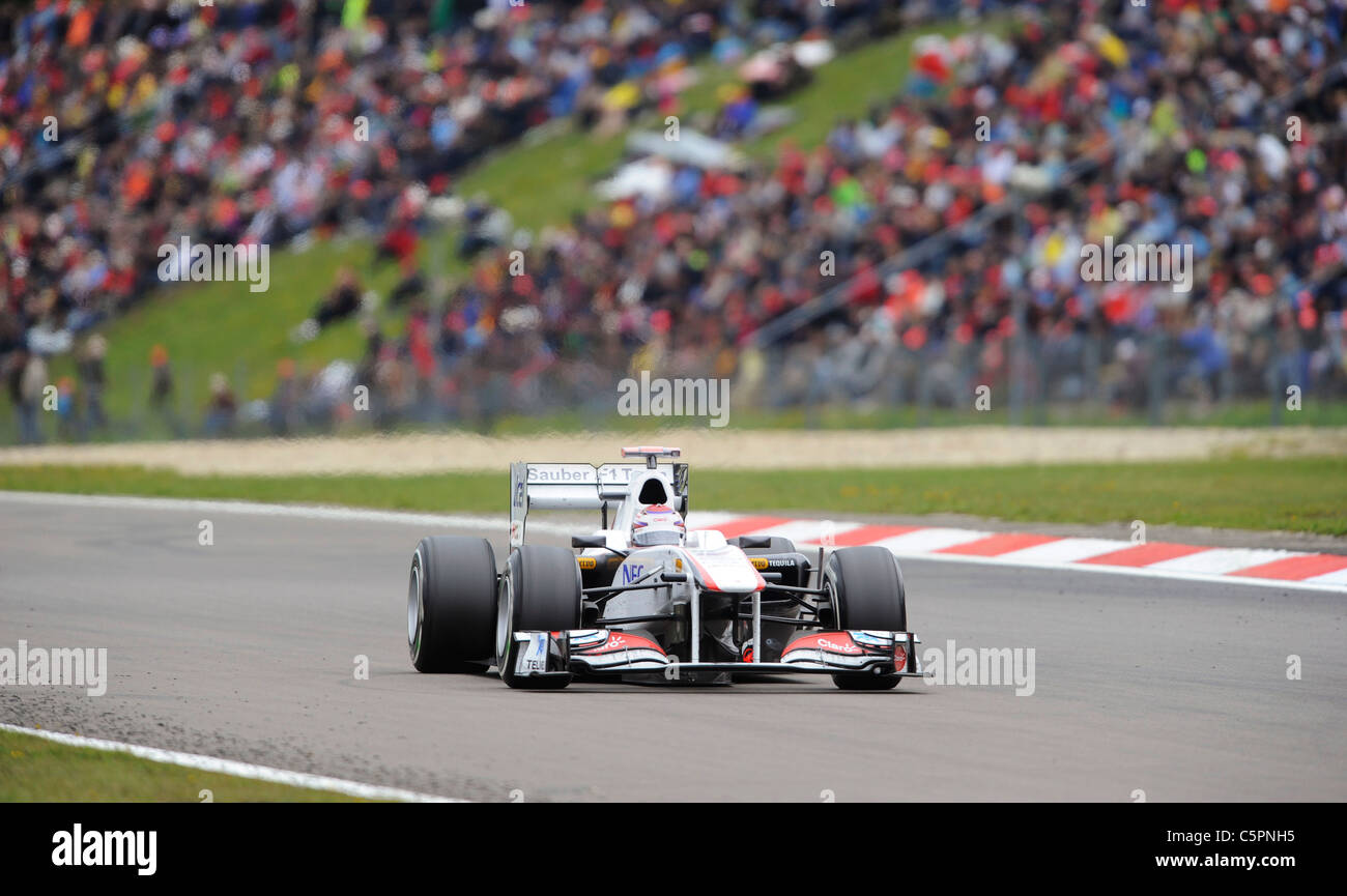 Kamui Kobayashi in front of the crowds at the German Formula One Grand ...