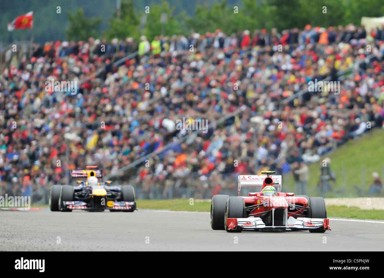 Massa and Vettel in front of the crowds at the German Formula One Grand ...