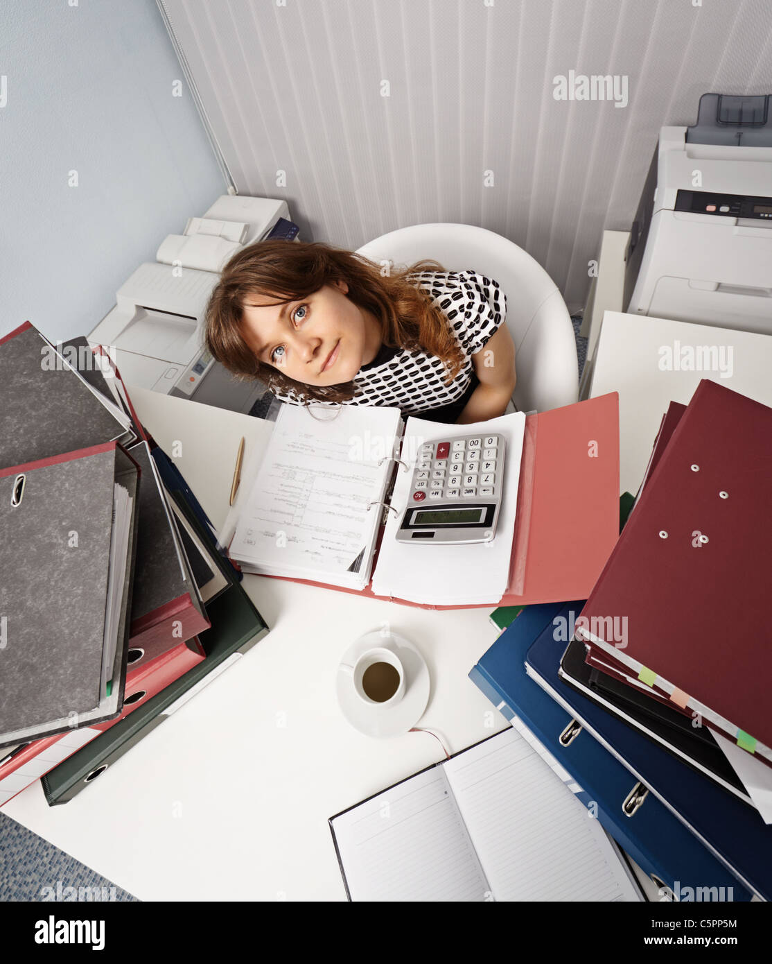 A young woman - a financier on workplace in the office Stock Photo - Alamy