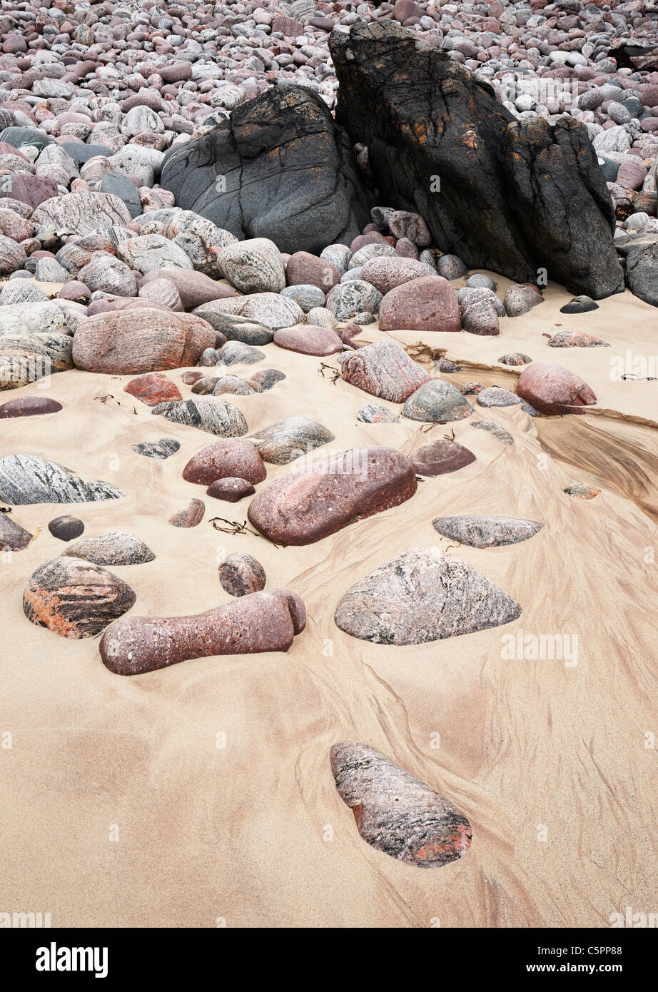 Stones and pebbles on the beach at Oldshoremore, Sutherland, Highland ...