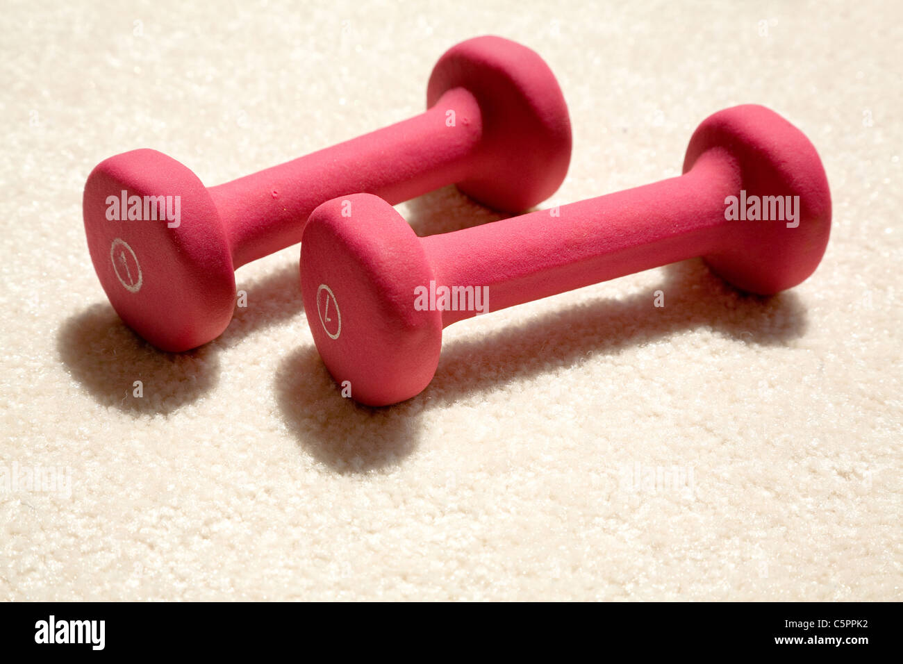 red Dumbbell close up shot Stock Photo - Alamy