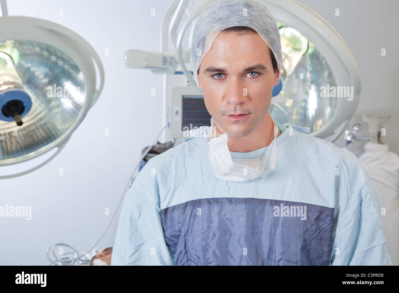 Close-up portrait of smart confident young male surgeon Stock Photo - Alamy