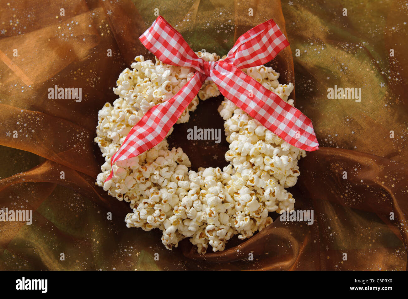Tradition christmas wreath made of popcorn with red and white ribbon ...