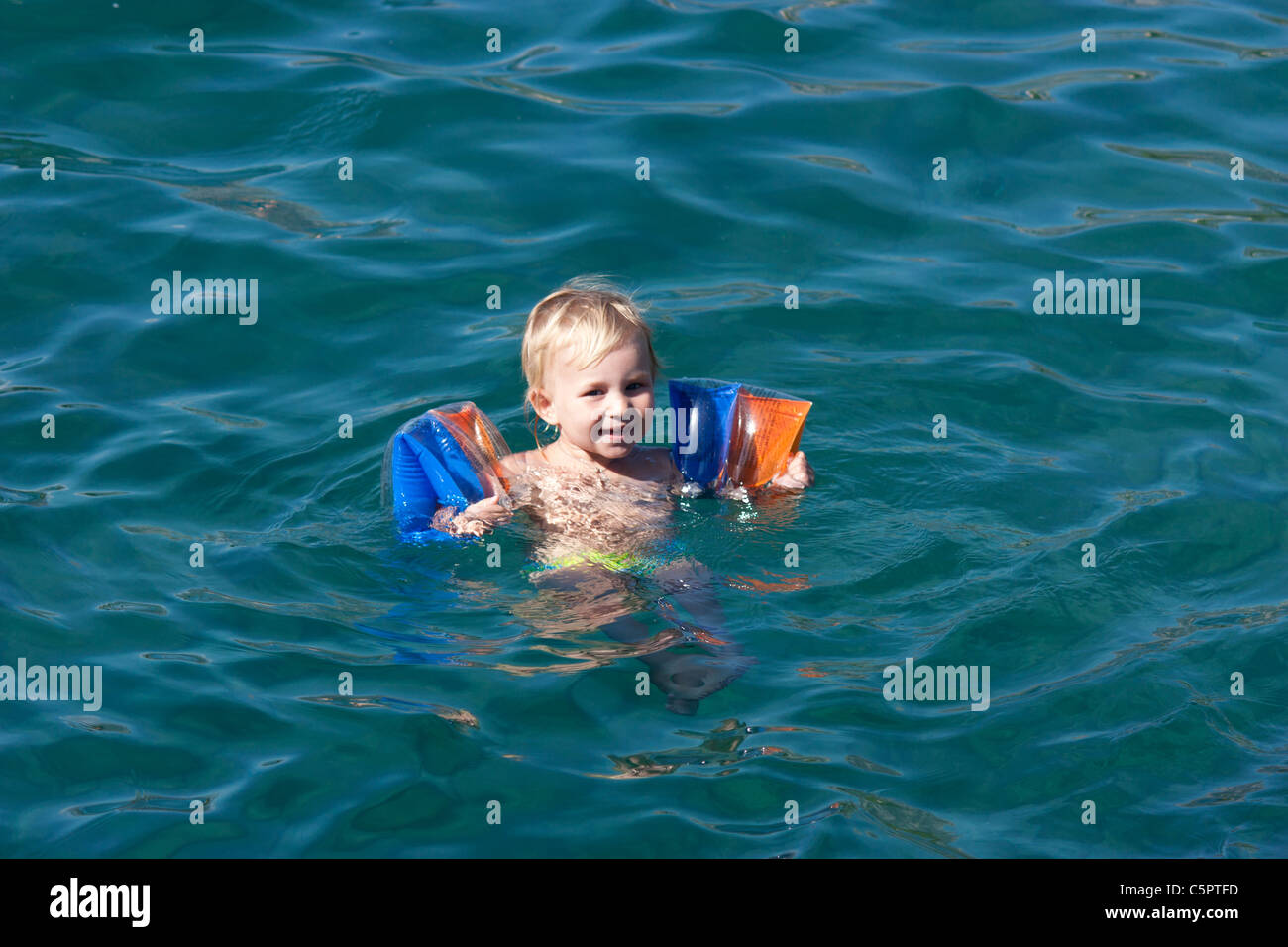 Armlets for swimming hi-res stock photography and images - Alamy